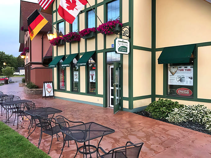 The exterior shows off Frankenmuth's Bavarian architecture with international flags flying, because this town knows how to blend cultures with style.