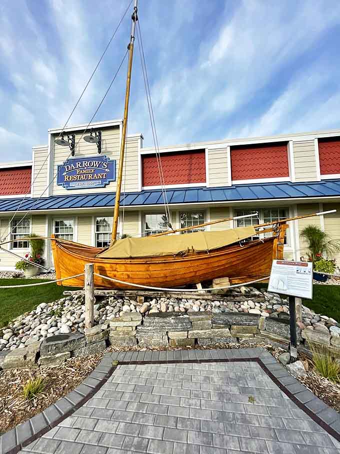 The wooden boat display honors Mackinaw City's maritime heritage while welcoming hungry travelers.