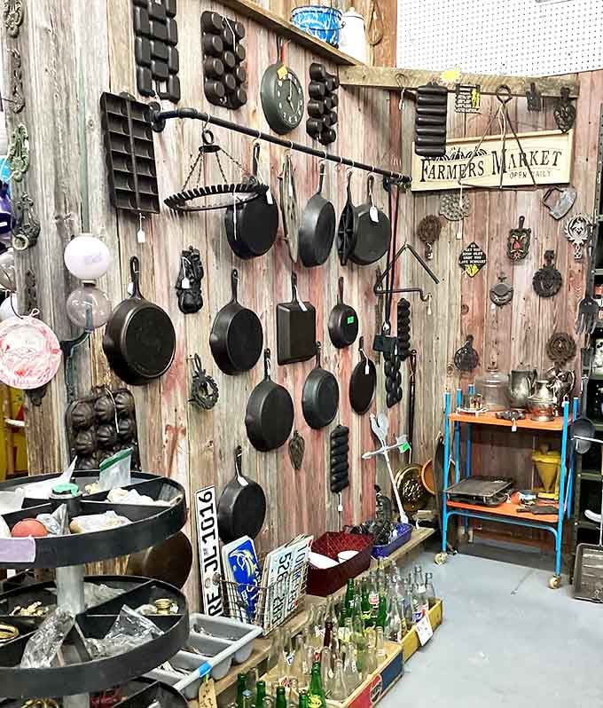 Cast iron cookware hanging like kitchen trophies &ndash; these seasoned veterans have seared steaks and fried chicken for generations and are ready for more.