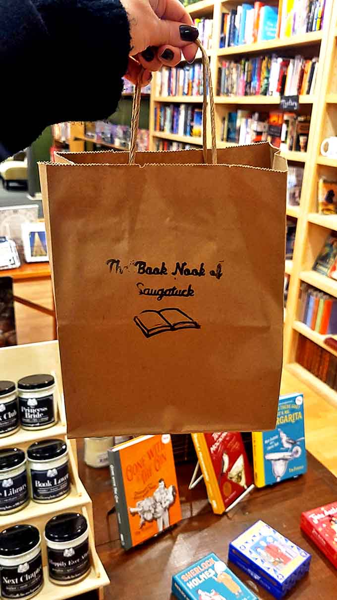 Each purchase leaves in this humble paper bag, a vessel for worlds unknown and adventures untold, stamped with the promise of return visits.