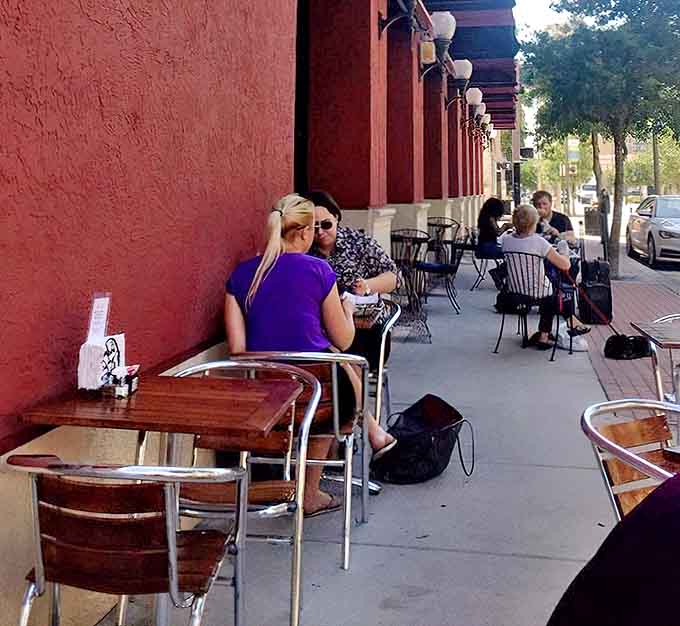 Sidewalk tables invite patrons to master the French art of people-watching while sipping something delicious and judging passersby (kindly, of course).