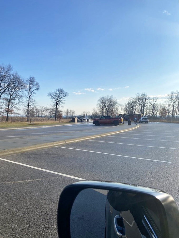 The preserve's spacious parking area welcomes visitors at the gateway to adventure, where history and nature await exploration.