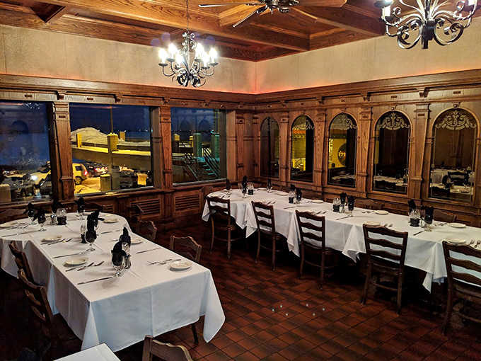 White tablecloths signal "special occasion" while wooden chairs whisper "make yourself at home" in this dining room where countless memories have been made.