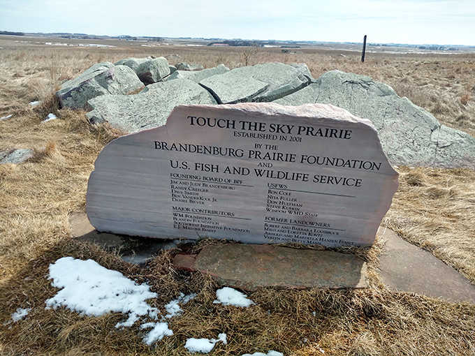 Carved in stone: The prairie's dedication marker stands as a testament to conservation efforts that preserved this slice of natural history.