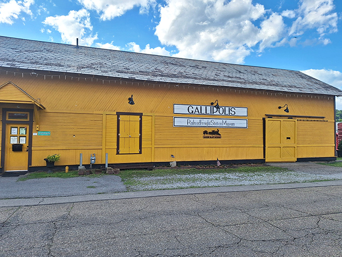 The bright yellow Railroad Freight Station Museum stands as a cheerful reminder of how the iron horse connected this river town to the wider world.