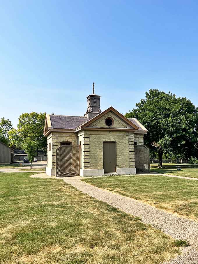 This charming outbuilding proves that even the mansion's supporting cast was designed with architectural flair &ndash; no ordinary shed would do!