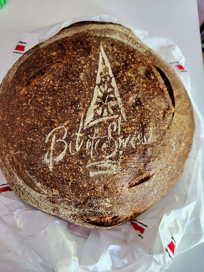 Not just bread, but an edible signature &ndash; each sourdough loaf proudly wearing the Bit of Swiss emblem like a badge of honor earned through perfect fermentation.