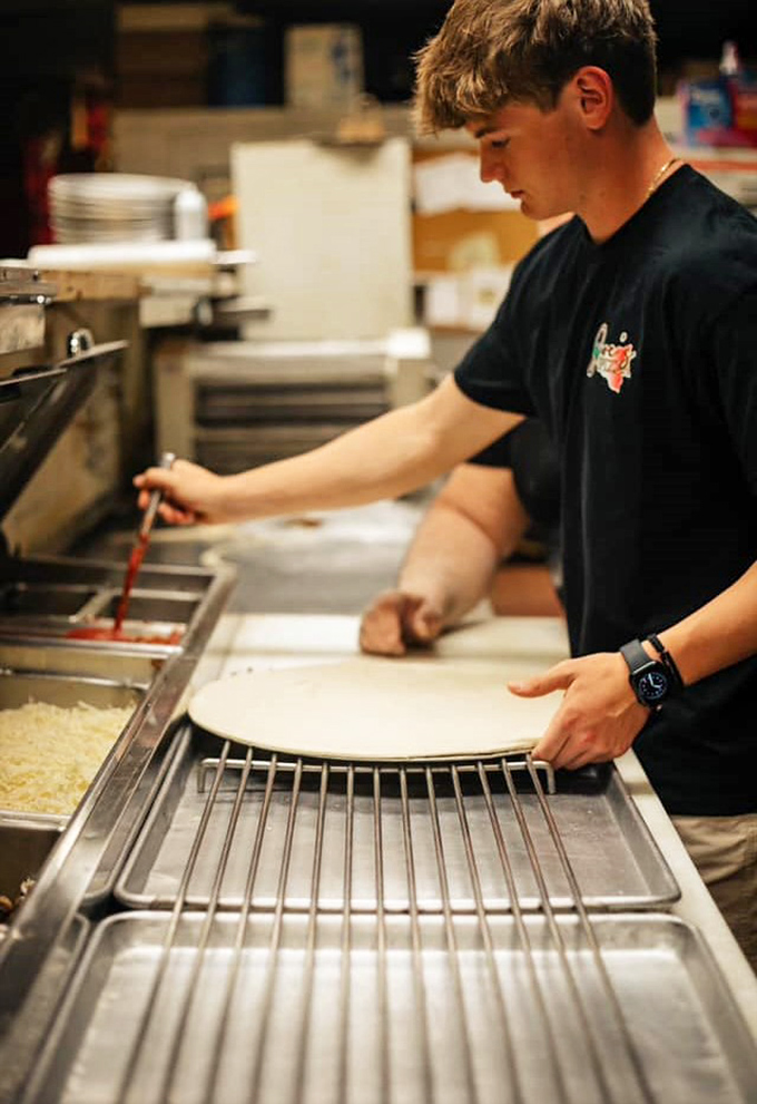 Young talent learning the craft &ndash; the next generation ensuring Joe's tradition continues with the same care.