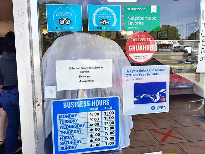 Store hours posted clearly because nothing's worse than arriving at a closed bakery when you're craving donuts.