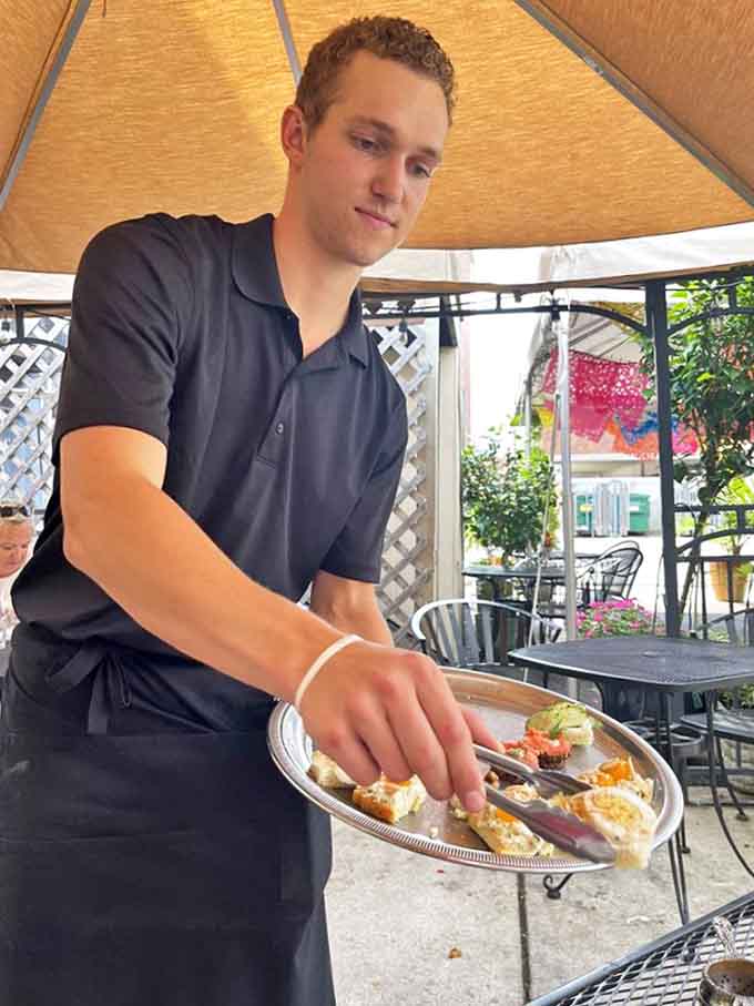 The unsung heroes who transform ingredients into experiences, carrying plates as if they contain treasures &ndash; because they do.