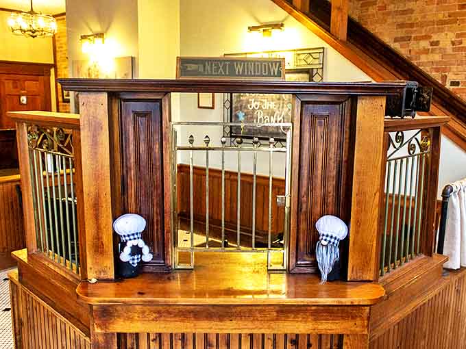 Historic teller windows now frame different transactions &ndash; the exchange of friendly greetings and memorable dining experiences.