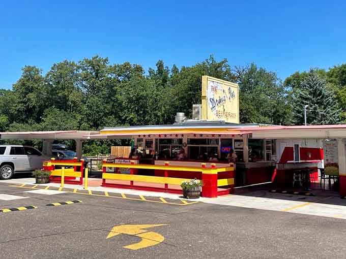 The classic drive-in setup remains unchanged, a time capsule of American dining culture that still works perfectly in modern times.