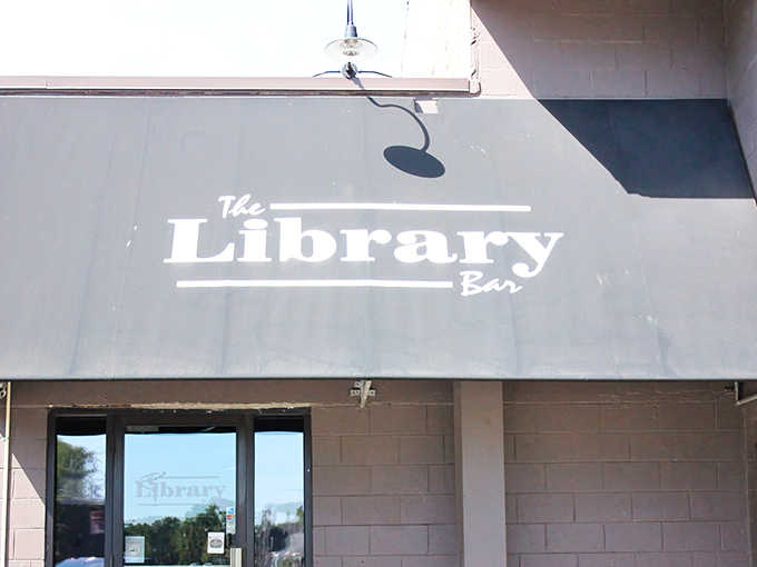 The Library Bar's signature signage promises what lies within &ndash; a perfect marriage of books and booze in an unassuming package.