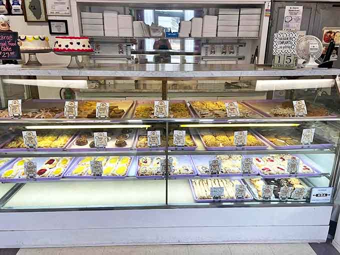 Sunshine-yellow umbrellas create breakfast oases on the sidewalk, perfect for people-watching with your pancakes.