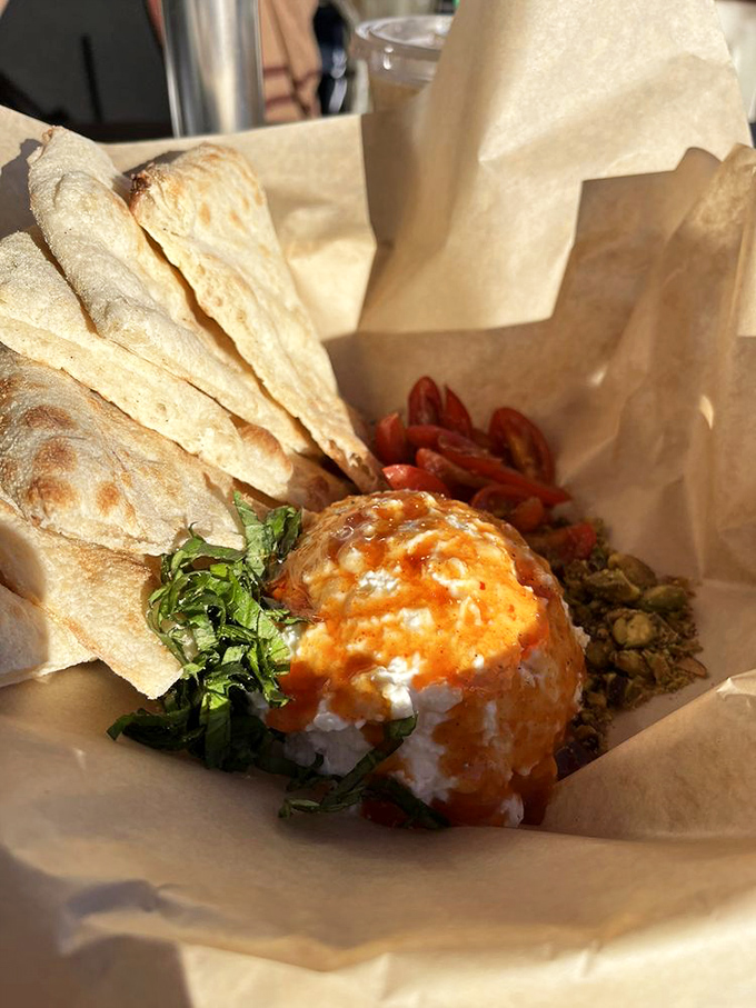 Not just an afterthought for non-meat-eaters, this veggie special proves plant-based toppings can create flavor symphonies that rival any carnivore's delight.