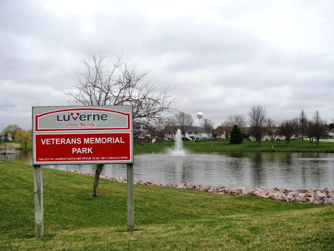 Veterans Memorial Park offers peaceful reflection beside waters that mirror both sky and sacrifice.