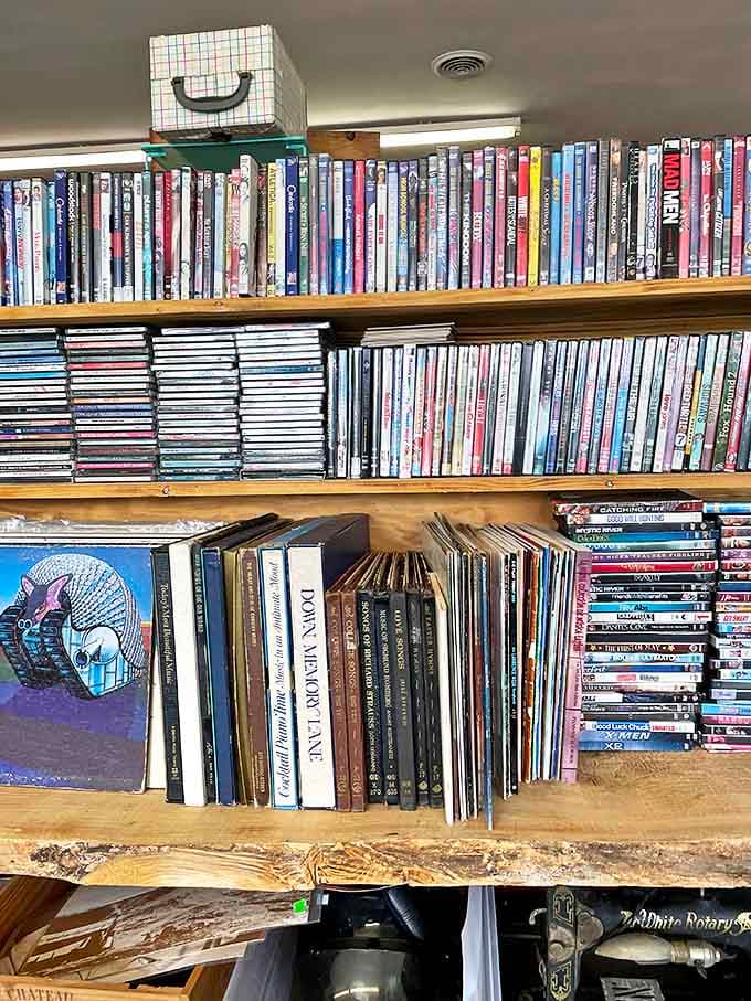 Media shelves packed with forgotten favorites &ndash; physical entertainment from when building a collection meant actual shelves, not playlists.