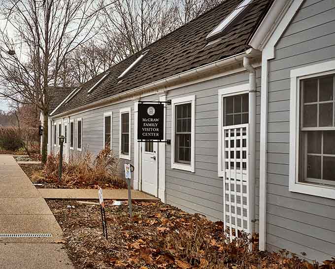 The modest Visitor Center welcomes guests with practical information, proving that even grand estates need someone to answer the inevitable "where's the bathroom?" question.