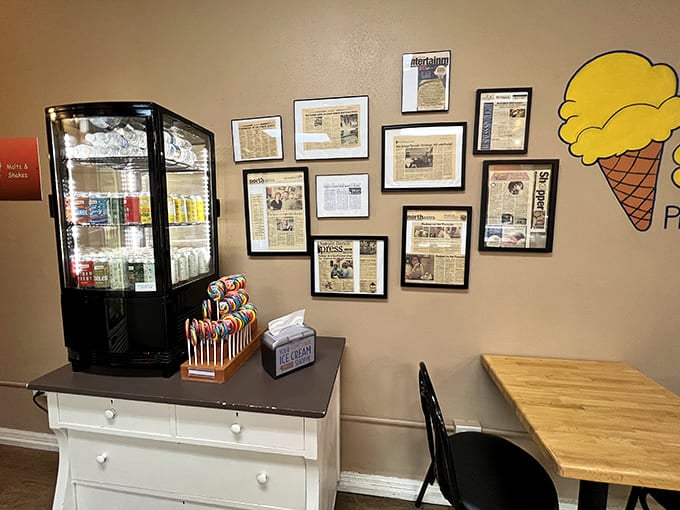 The wall of fame features newspaper clippings chronicling Two Scoops' journey from local secret to beloved institution worthy of pilgrimage.