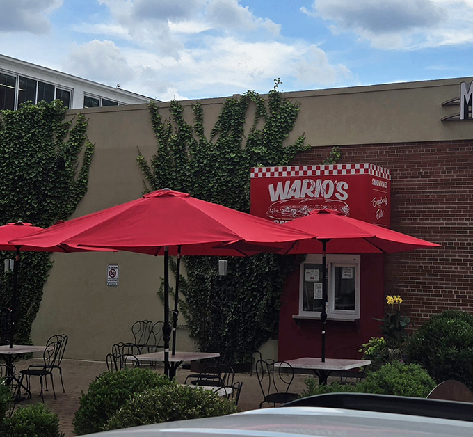 Wario's Patio: Red umbrellas create an inviting oasis where sandwich enthusiasts can savor their treasures in the open air.