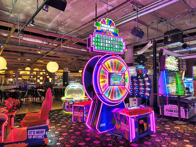 The Wheel of Fortune-style game dominates the ticket redemption area, its bright lights drawing hopeful players dreaming of jackpots.