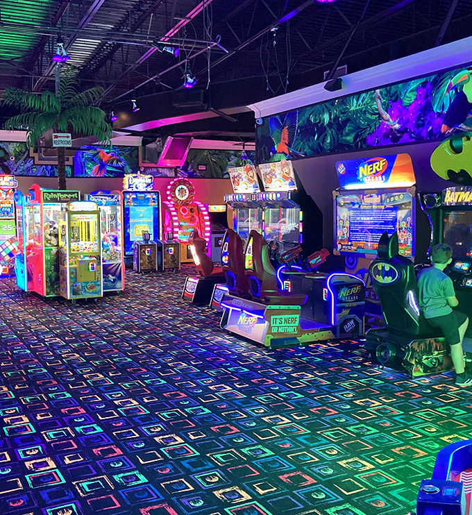 The arcade section buzzes with neon energy, its games calling out like mechanical sirens to players young and old.