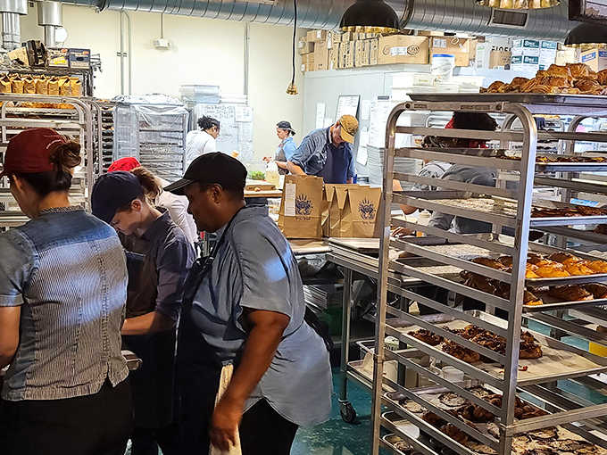 Baking Area: Behind the scenes, the magic happens as bakers transform simple ingredients into edible art with practiced precision.