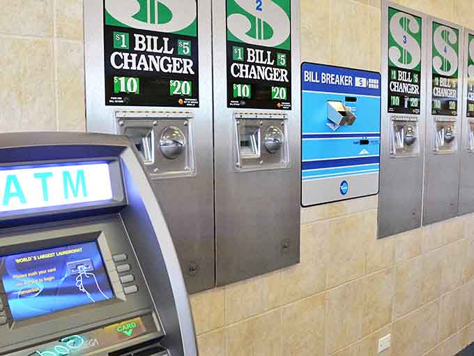 The wall of bill changers stands ready to transform your paper money into laundry currency.