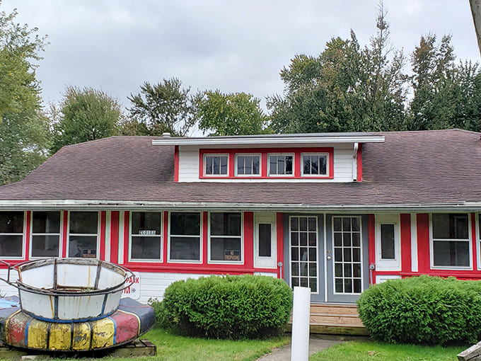 The former park museum wears its red trim like faded lipstick&mdash;a last touch of vanity on a face weathered by decades of neglect.
