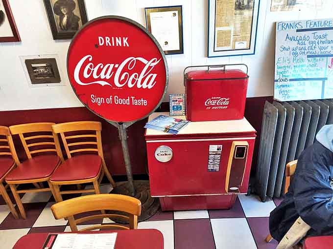 Coke Memorabilia: Vintage Coca-Cola nostalgia creates the perfect backdrop for enjoying America's favorite burger companion – preferably in a glass bottle.
