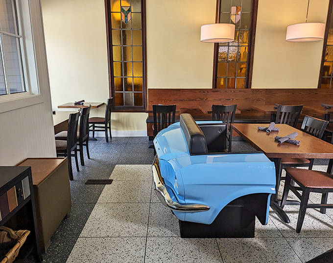 The blue car booth isn't just seating &ndash; it's the most sought-after spot in the house, where dining becomes an experience kids and adults equally adore.