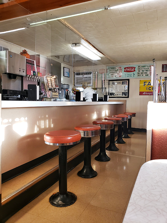The lunch counter view &ndash; where regulars have been claiming "their" stool for generations of charbroiled perfection.