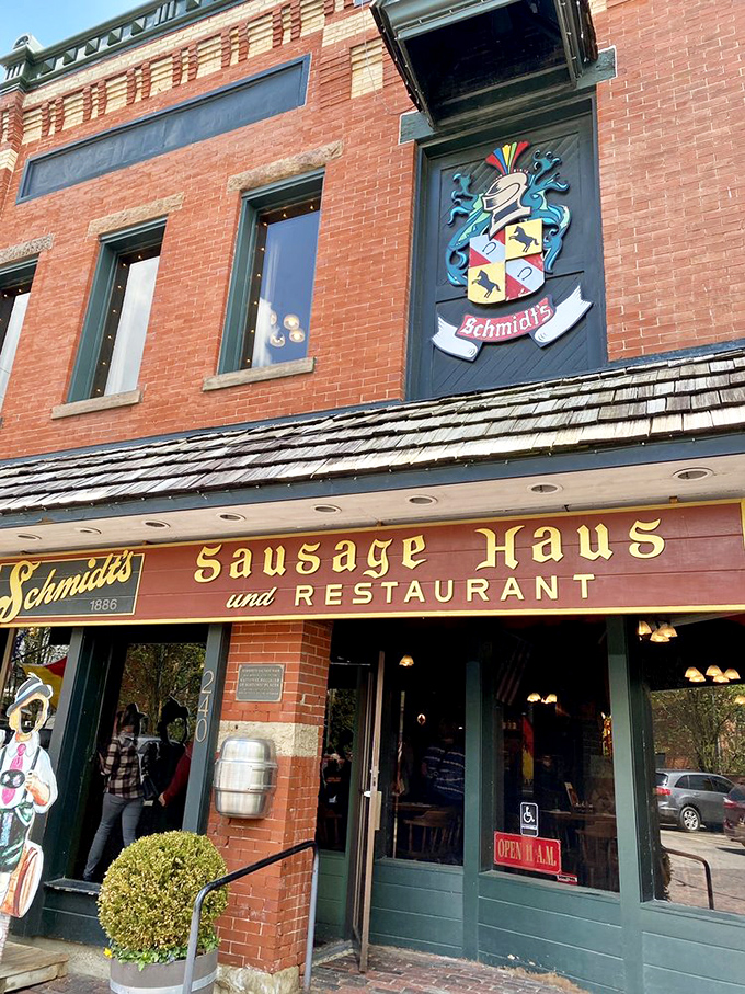 The welcoming entrance to Schmidt's promises an authentic German experience, complete with flags that honor both American and Bavarian heritage.