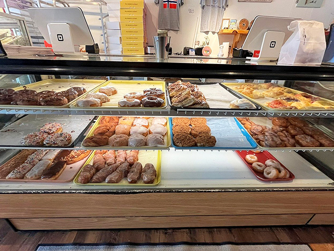 Rows of decorated cookies proving that art school and culinary school can absolutely join forces for the greater good.