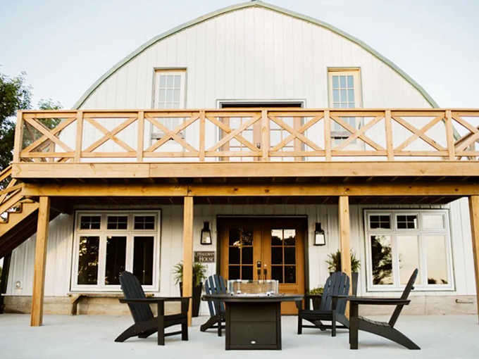 Adirondack chairs positioned for perfect sunset viewing &ndash; just add your favorite beverage and prepare for nature's show.