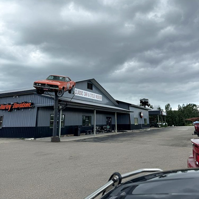 The dealership's exterior gives just a hint of the treasures within &ndash; that elevated Charger is your first clue.