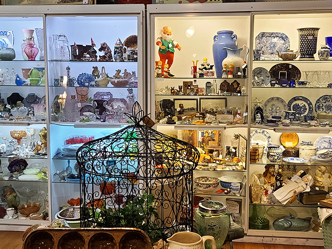 Glass cabinets protect delicate treasures while creating a kaleidoscope effect, with colored glass and porcelain creating a feast for the eyes.