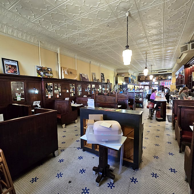 The hexagonal floor tiles have supported generations of sugar-seekers &ndash; each worn spot represents thousands of happy customers making their pilgrimage to chocolate paradise.