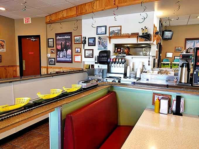 The interior blends railroad history with diner comfort, creating an atmosphere where nostalgia meets appetite in the most delightful way.