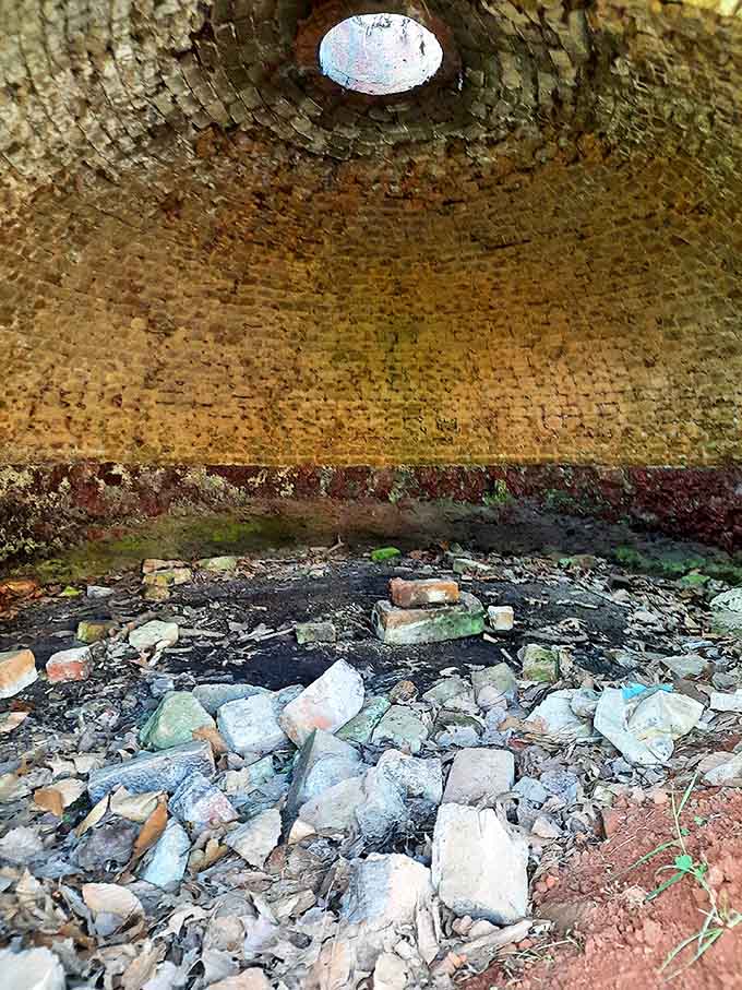 Peering into the blackened dome reveals remarkable craftsmanship, each brick placed by hand to create the perfect environment for transforming coal into coke.