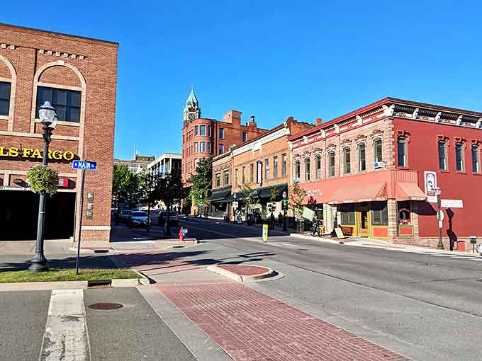 Main Street's gentle slope leads the eye toward Lake Superior, a constant reminder of nature's presence in this urban setting.