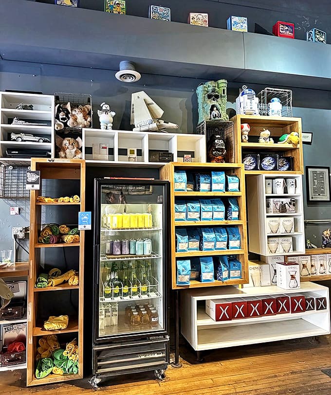 Shelves brimming with action figures, vintage toys, and carefully selected coffee beans create a retail experience as unique as the caf&eacute; itself.