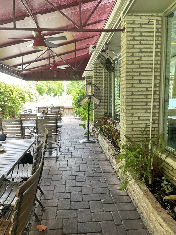 Howley's covered patio offers a pleasant outdoor dining option, perfect for enjoying Florida's beautiful weather with your comfort food favorites.