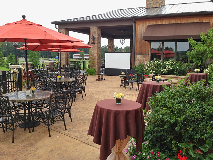 Al fresco dining under cheerful red umbrellas &ndash; the perfect setting for sipping local wines while soaking in vineyard views.