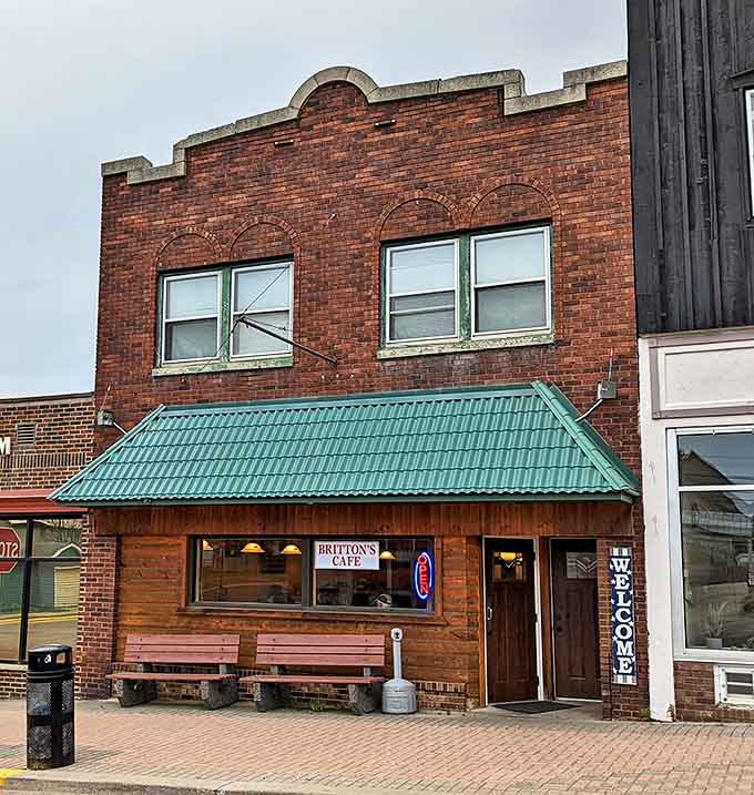 The exterior view showcases Britton's brick-and-wood charm, with benches offering a spot to savor the anticipation before entering.