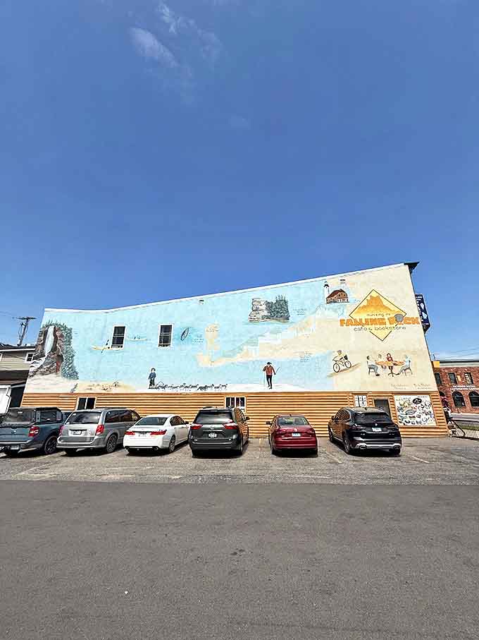 Parking area: The mural-adorned exterior wall – a colorful tribute to local landscapes that serves as your first hint this isn't just any cafe.