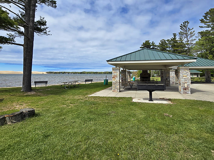 The park's picnic pavilion offers a shaded respite after dune climbing adventures, with Lake Michigan's sparkling waters providing the perfect lunchtime backdrop.