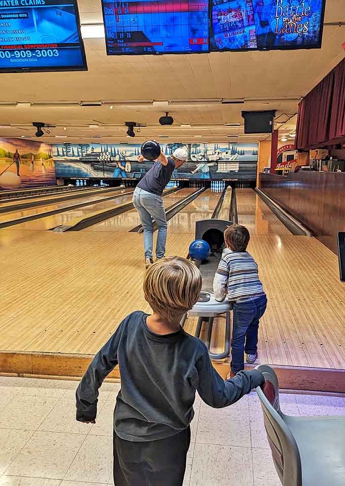 Generations come together at Woody's lanes, where bowling isn't just a game but a tradition passed down with each roll down the polished wood.