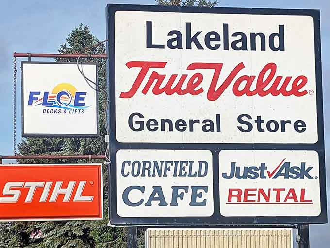 The roadside sign announces this triple-threat establishment &ndash; hardware, food, and rentals under one roof. Minnesota efficiency at its best!