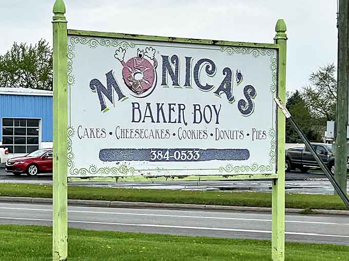 The sign that's become a beacon of hope for sweet-toothed travelers seeking salvation in fried dough form.